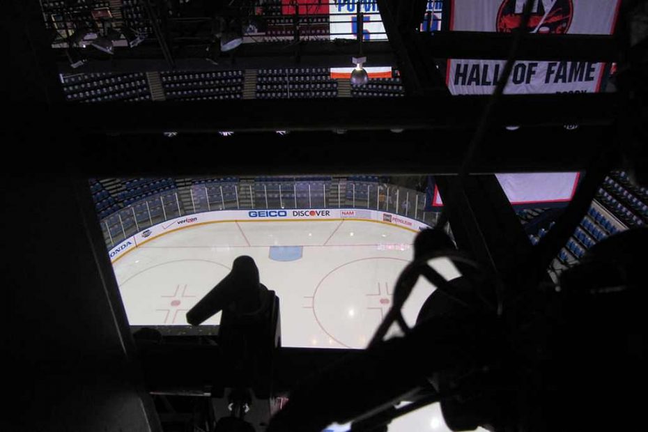 Photographing hockey from above the net